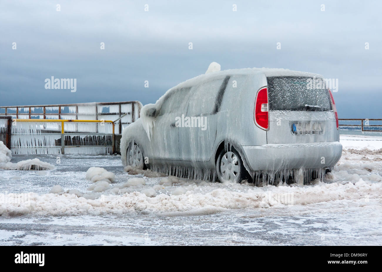 Car covered with thick ice parking near sea at winter Stock Photo - Alamy