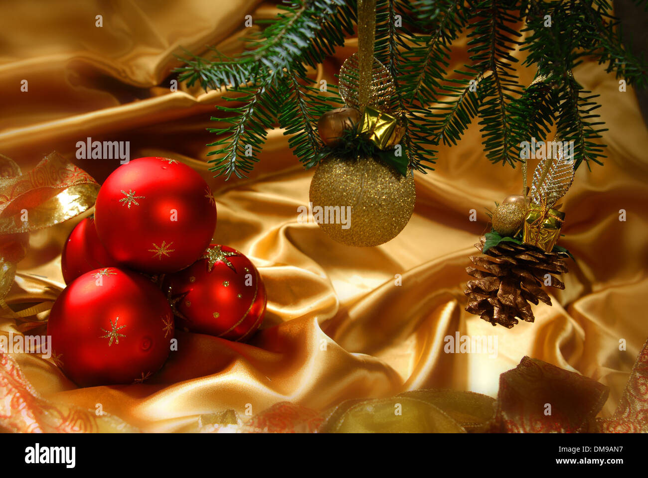 Christmas balls on a gold background Stock Photo - Alamy