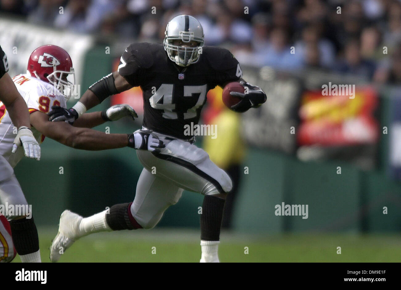 Oakland Raiders runningback, Tyrone Wheatley (47) makes his way down ...