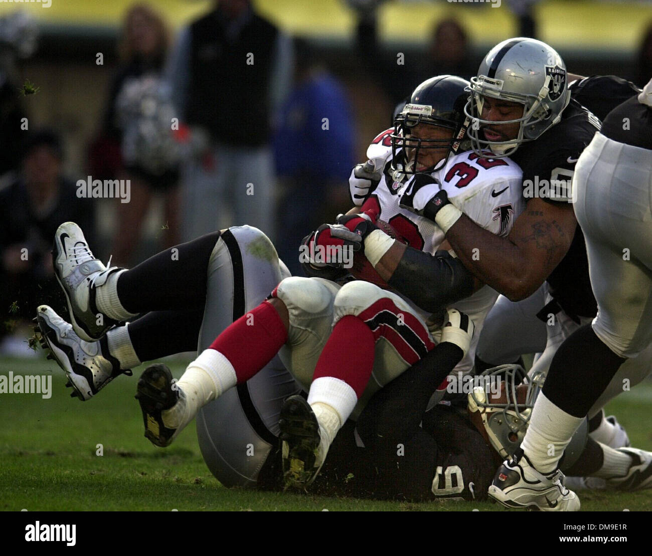 Atlanta Falcon runningback Jamel Anderson is stopped for no gain by ...