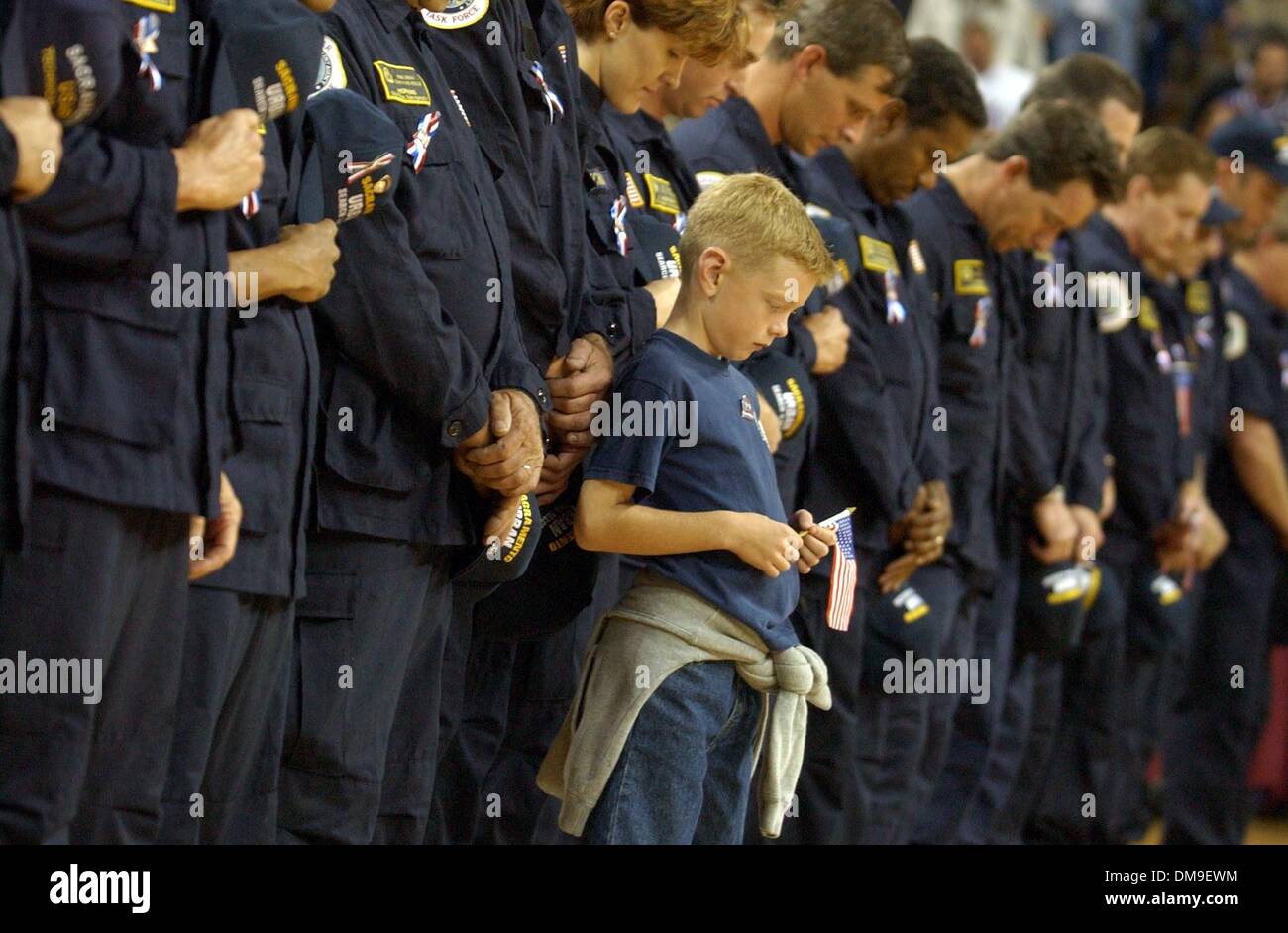 During the Kings opening home game, Brett Emery 7, with his father ...