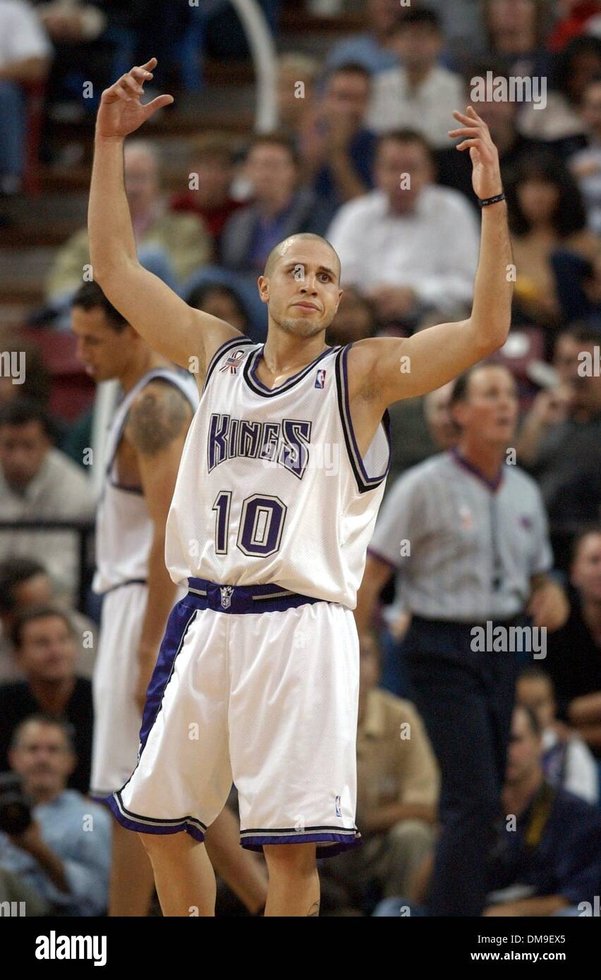 Mike Bibby throws his arms up in discuss over a bad call by a referee ...