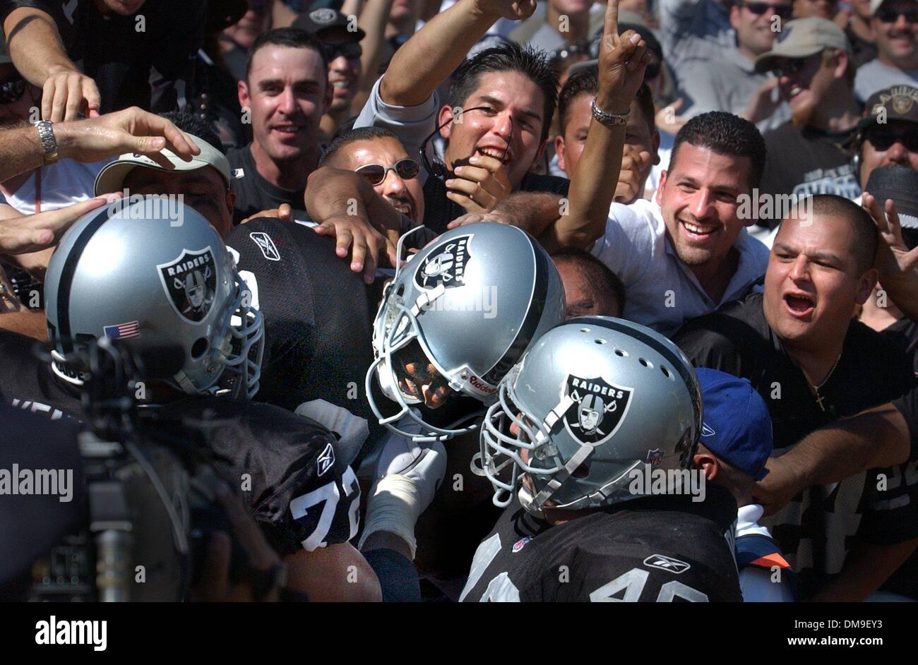 Jerry Rice jumps into the Raider fans after scoring his second TD in ...