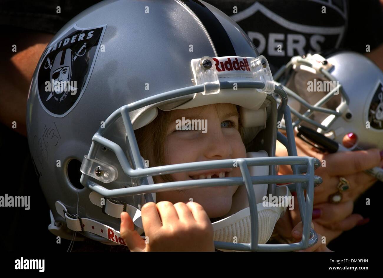 Oakland Raiders fan Kristin Gomes, 5, of Los Banos, smiles through her ...