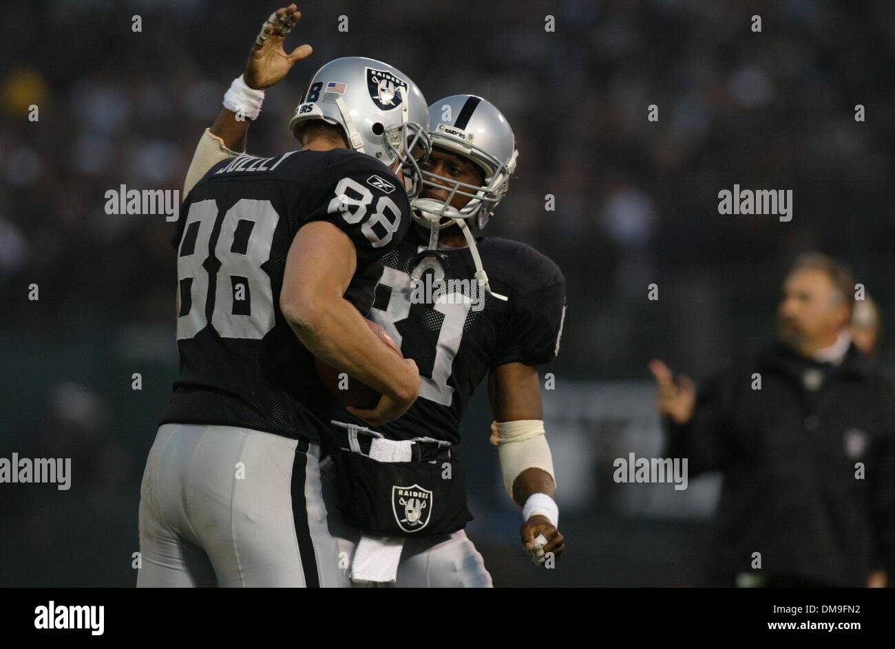 Raider Doug Jolley celebrates with Tim Brown after Jolley's Touch down ...