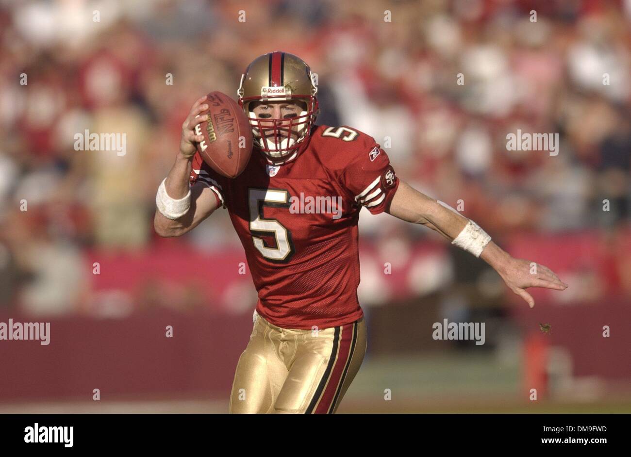 Jeff Garcia runs from the pocket in the second quarter in the NFC Wild ...