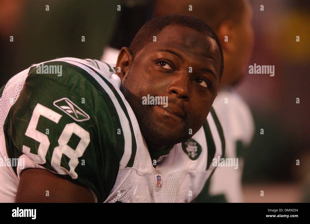 New York Jets linebacker Jason Glenn watches the final moments of the ...