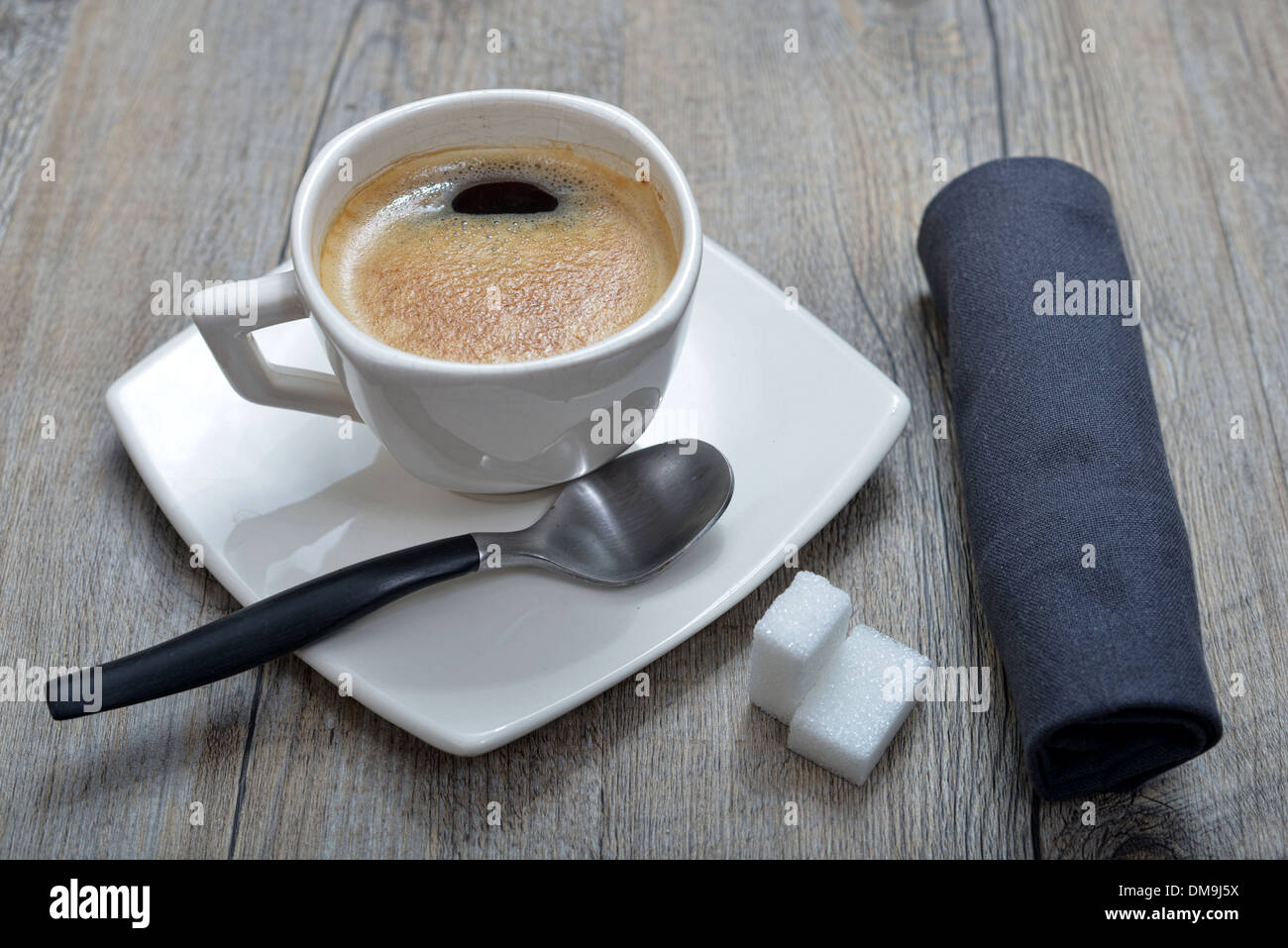 cup of coffee with two lump of sugar Stock Photo - Alamy
