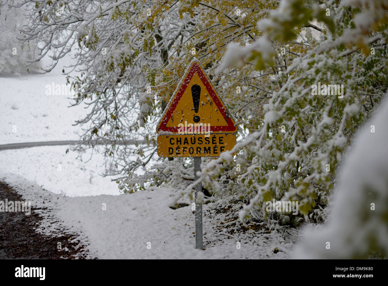 road sign under a layer of fresh snow Stock Photo - Alamy