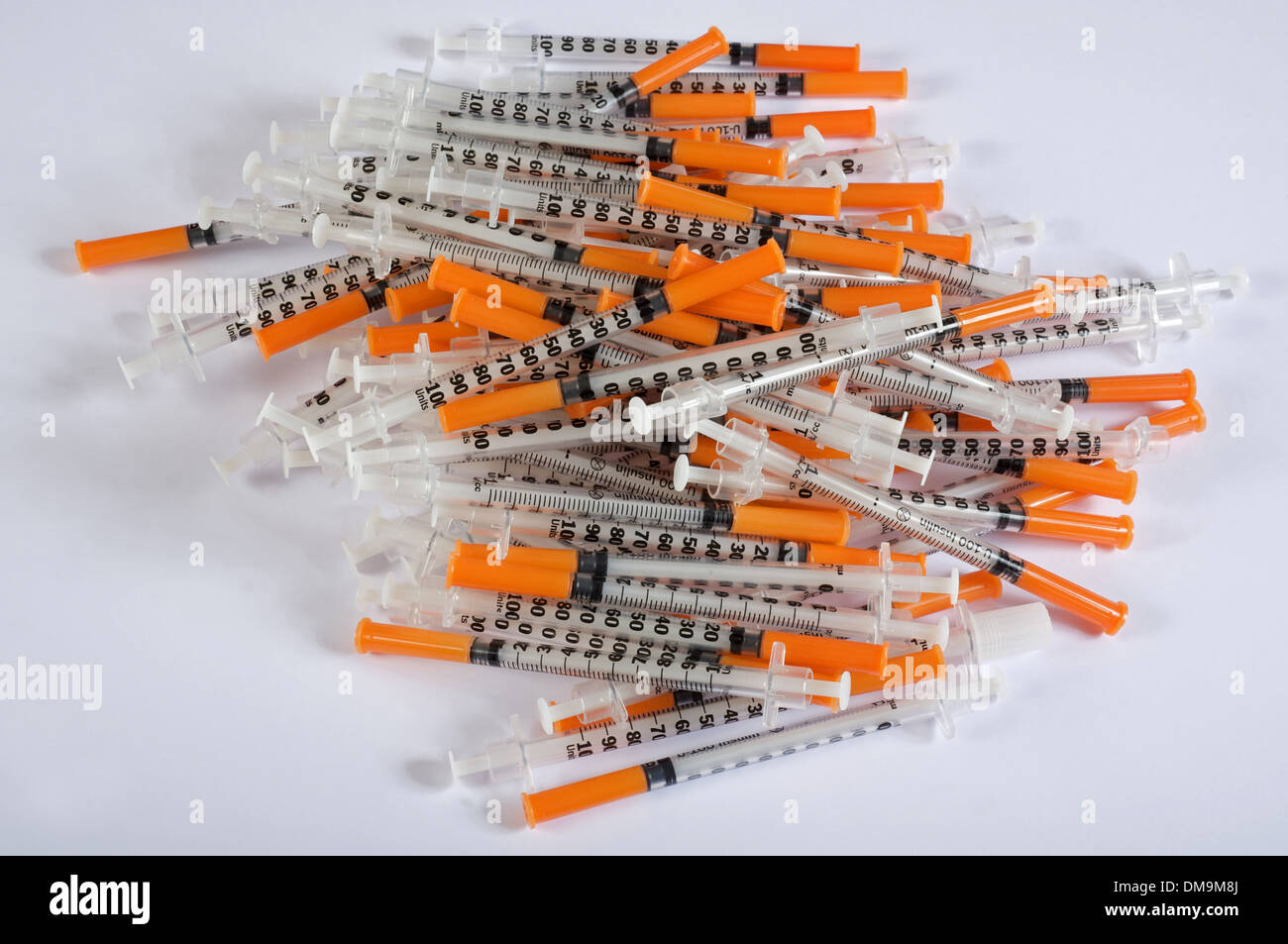 Pile of plastic disposable syringes Stock Photo - Alamy