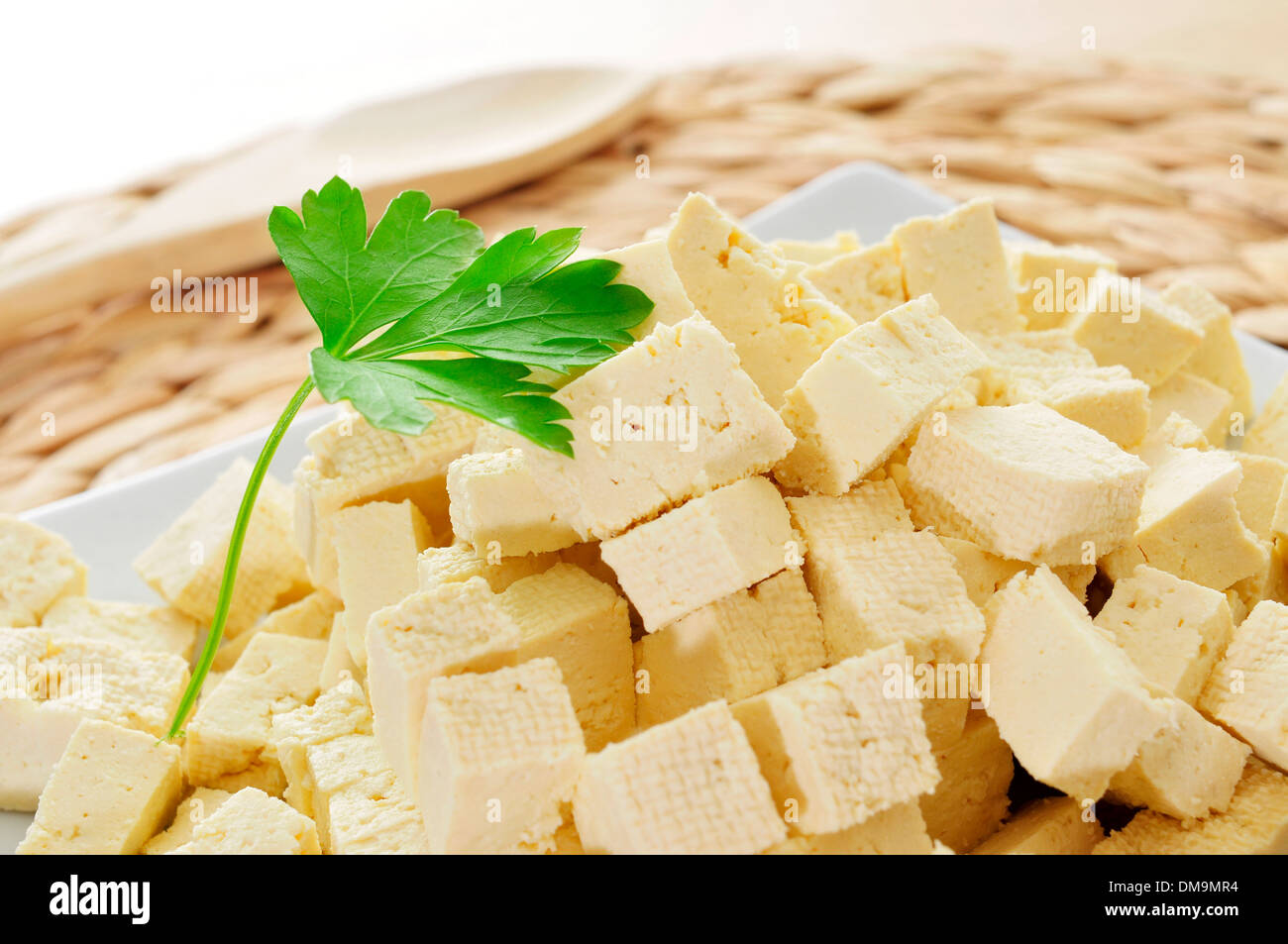 diced tofu in a plate, on a worktop Stock Photo - Alamy