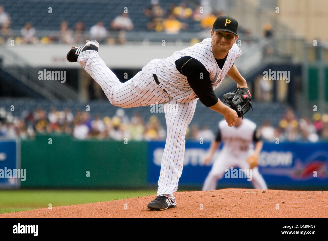 23 August 2009: Pirates starting pitcher Kevin Hart (25) delivers a ...