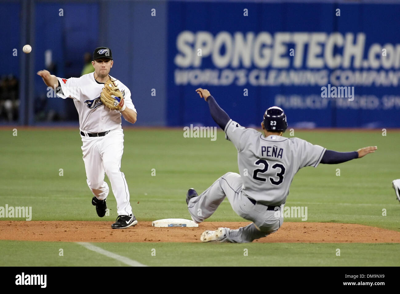 26 August 2009: Tampa Bay Rays first baseman Carlos Pena slides into ...