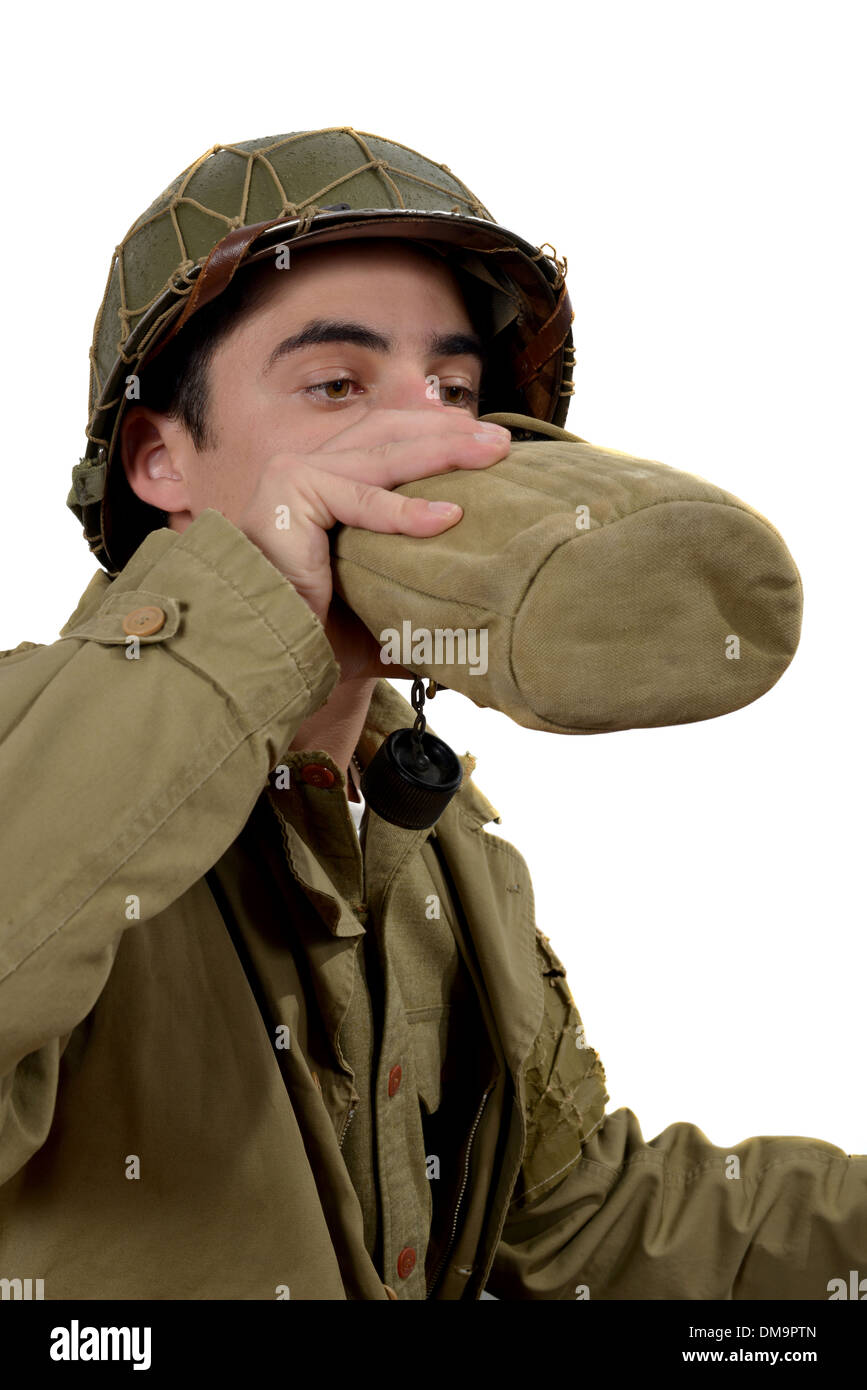 young american soldier drink water in canteen Stock Photo - Alamy