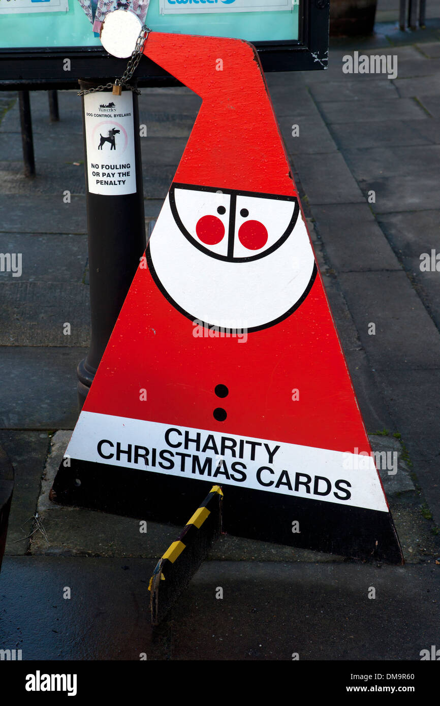 Charity christmas cards sign shaped as Santa Claus Stock Photo - Alamy