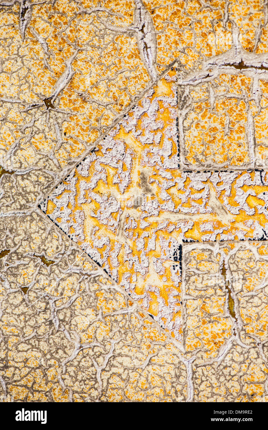Grungy texture on old and worn road sign with directional arrow Stock ...