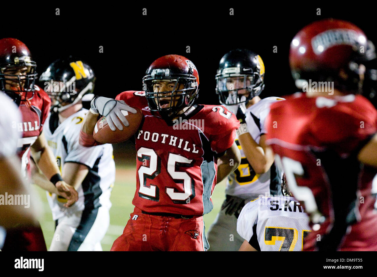 The Foothill Cougars Marcia Lawson celebrates after gaining yards ...