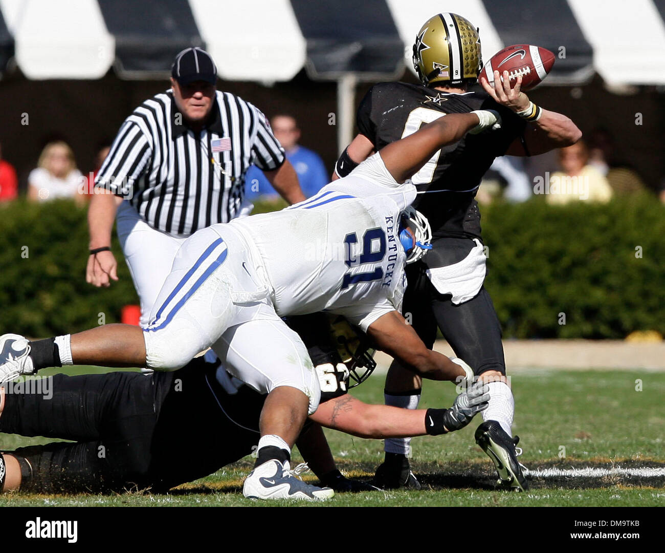 Vanderbilt quarterback Mackenzi Adams just got the ball away before ...