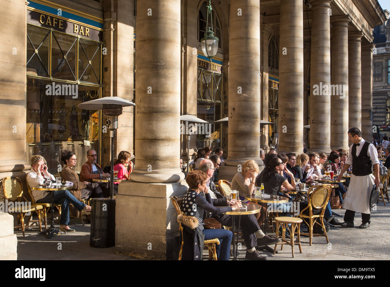 CUSTOMERS OUTSIDE AT THE SIDEWALK CAFE LE NEMOURS, PLACE COLETTE, PARIS ...
