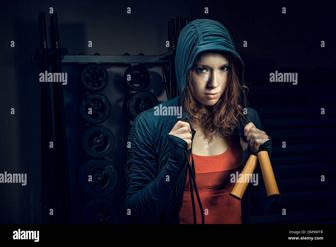 Young female training in a gym Stock Photo - Alamy