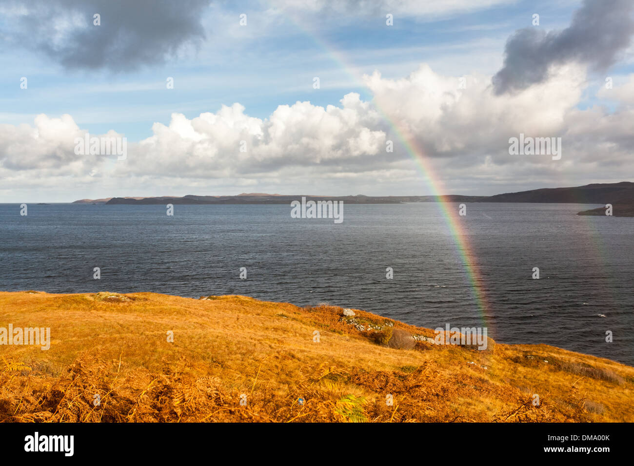 Rainbow over sea coastal town hi-res stock photography and images - Alamy