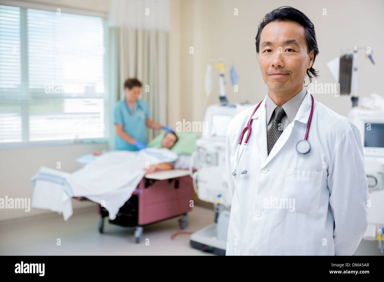 Confident Doctor on Renal Ward Stock Photo - Alamy