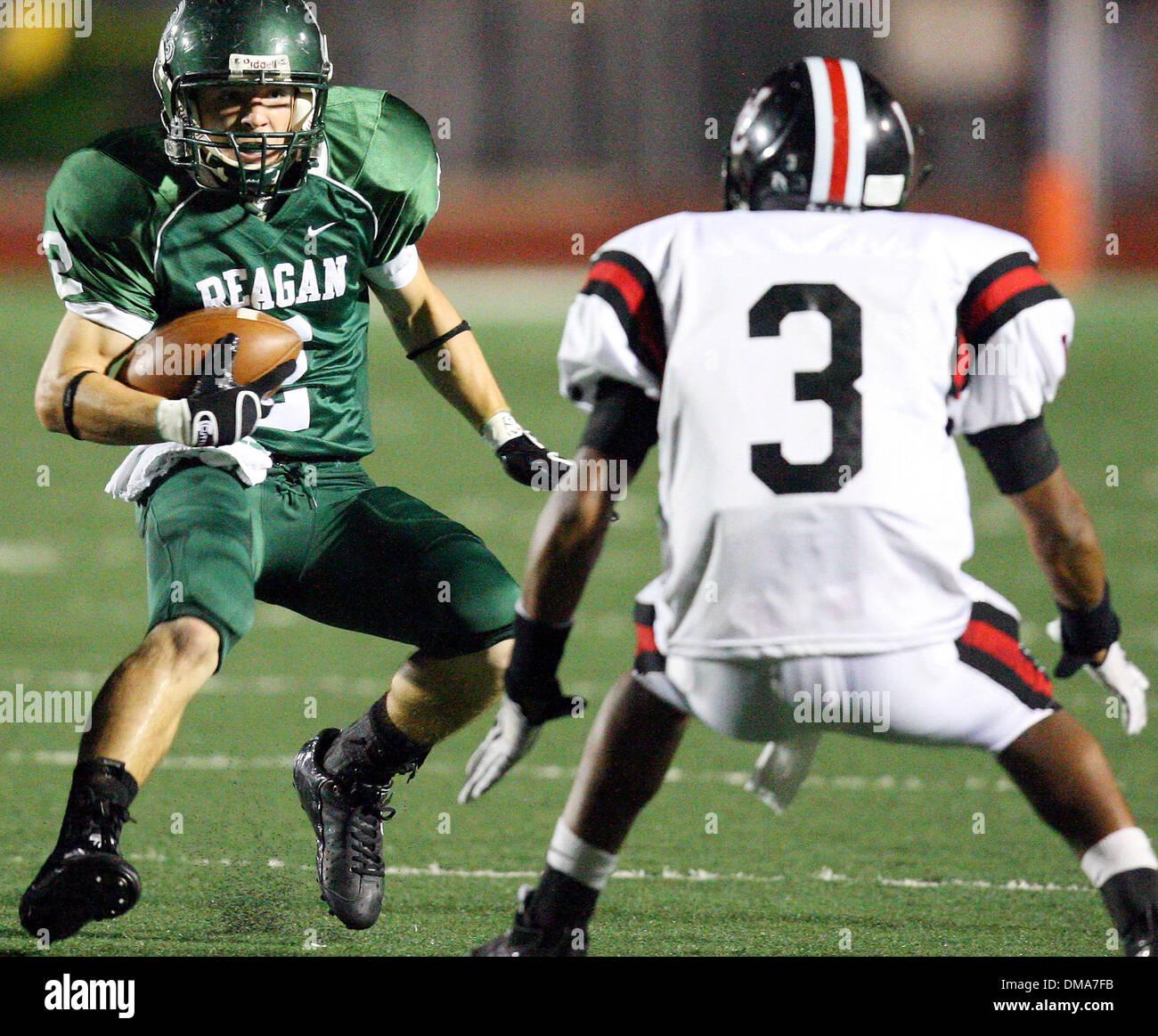 FOR SPORTS - Reagan's Jordan Mengele (left) looks for room around ...