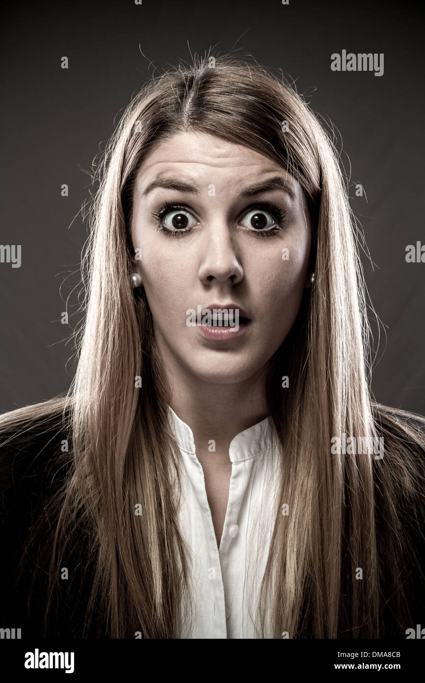 Studio portrait woman shocked expression hi-res stock photography and ...