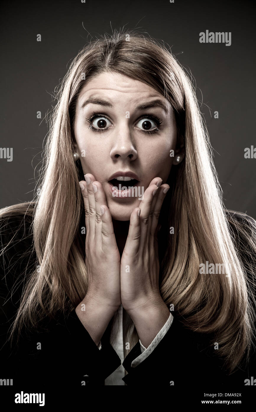 Surprised woman hi-res stock photography and images - Alamy