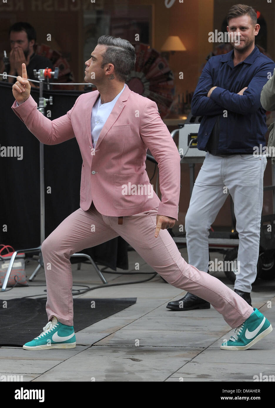 Robbie Williams films scenes for his new video in Spitalfields Market East London London England ...