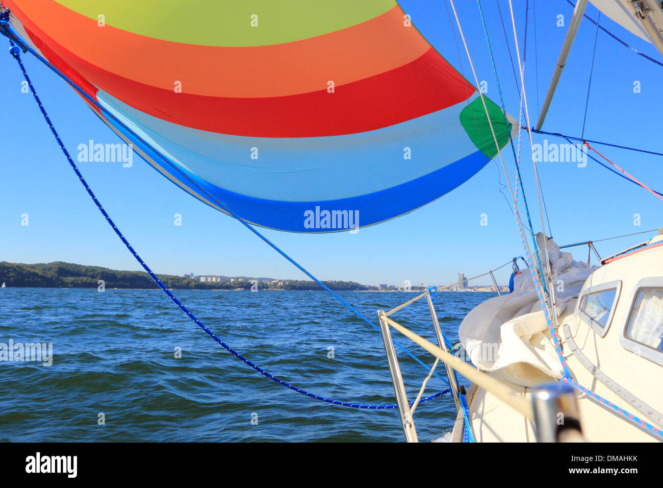 The wind has filled the spinnaker on sailing yacht. Detail of a ...