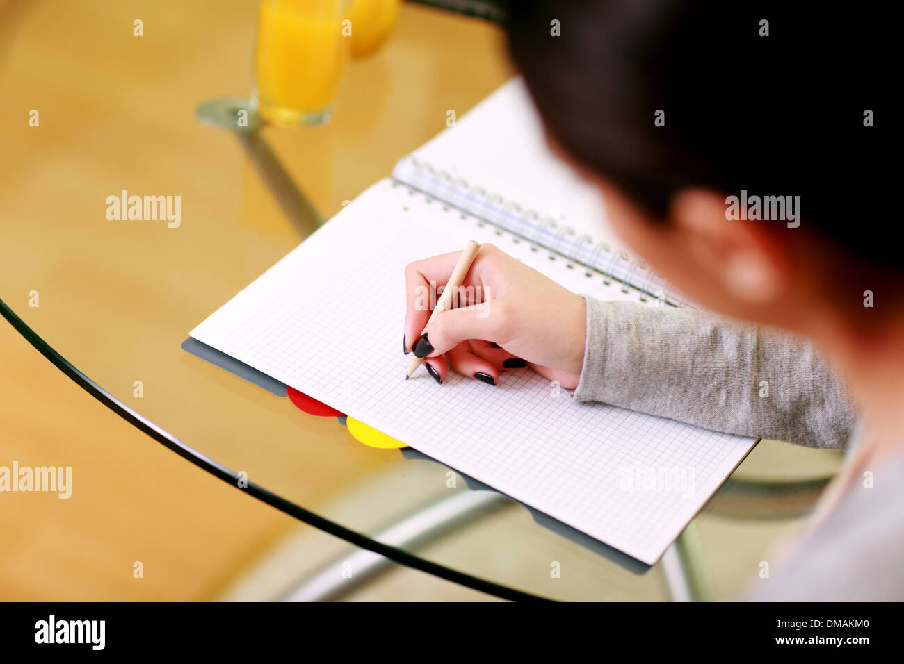 Closeup portrait of a female hand writing notes Stock Photo - Alamy