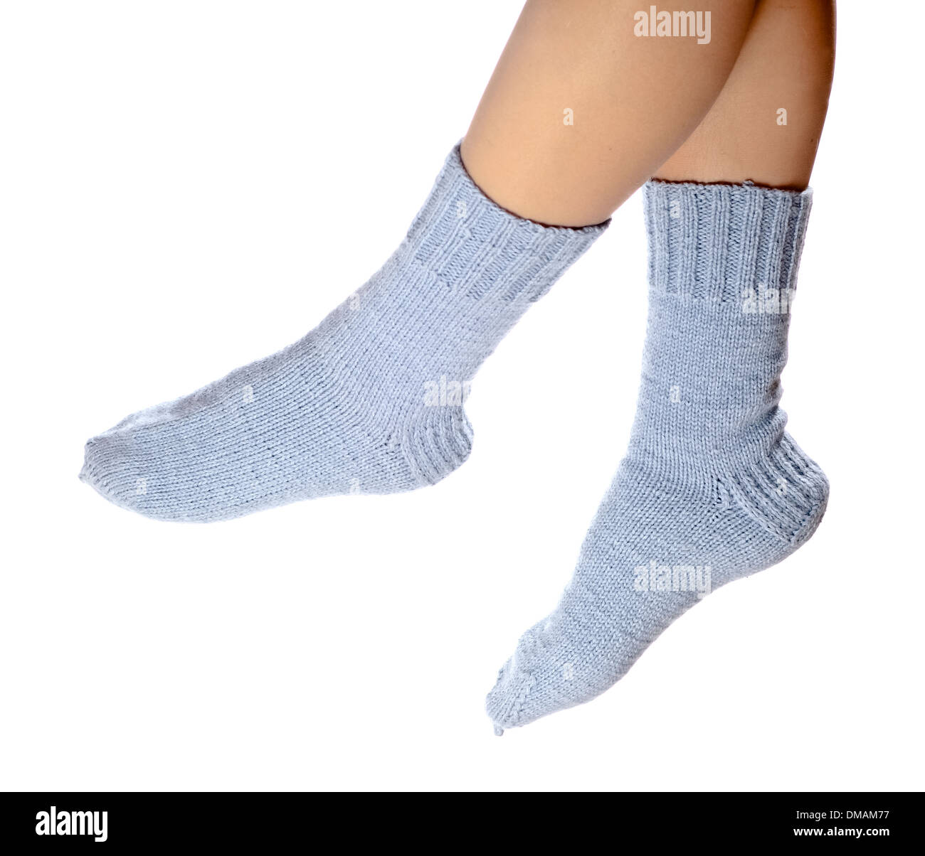 woman legs in woollen socks on white background Stock Photo - Alamy