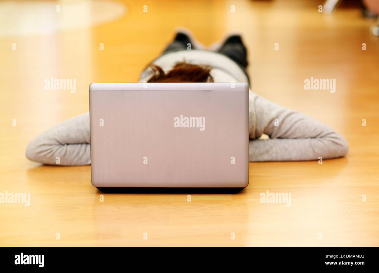 Beautiful woman lying on floor hi-res stock photography and images - Alamy