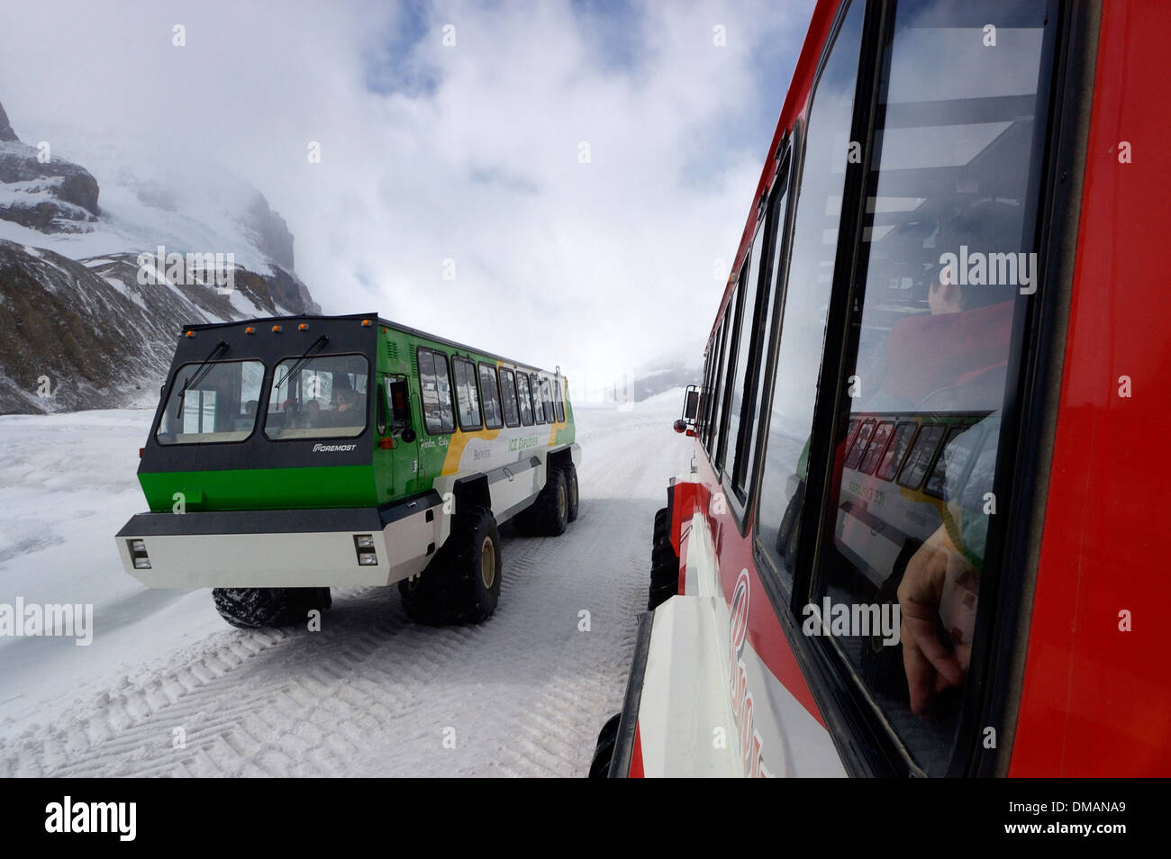 Snow coaches at the Athabasca Glacier. Banff and Jasper National Parks ...