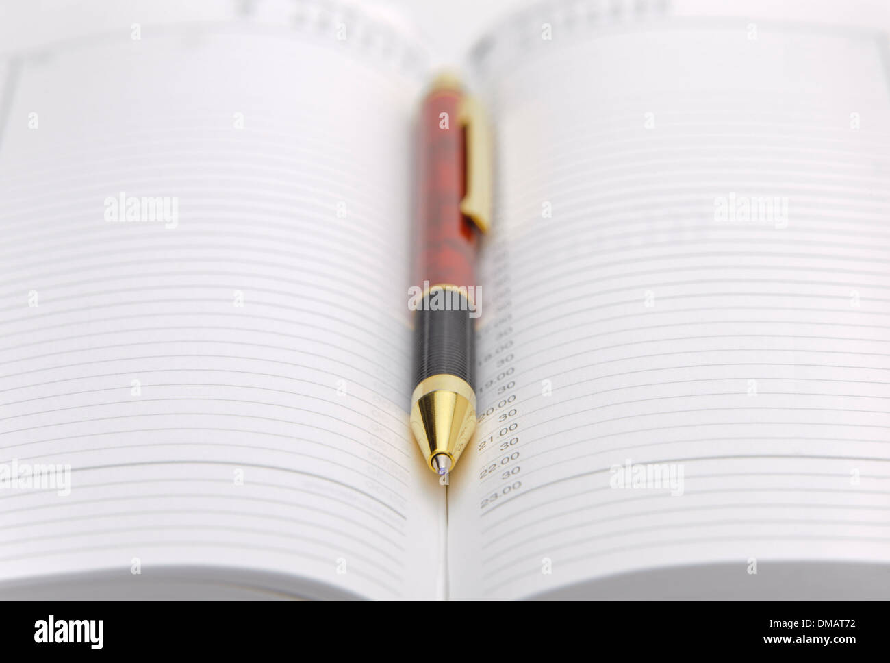 time planner with pen Stock Photo - Alamy