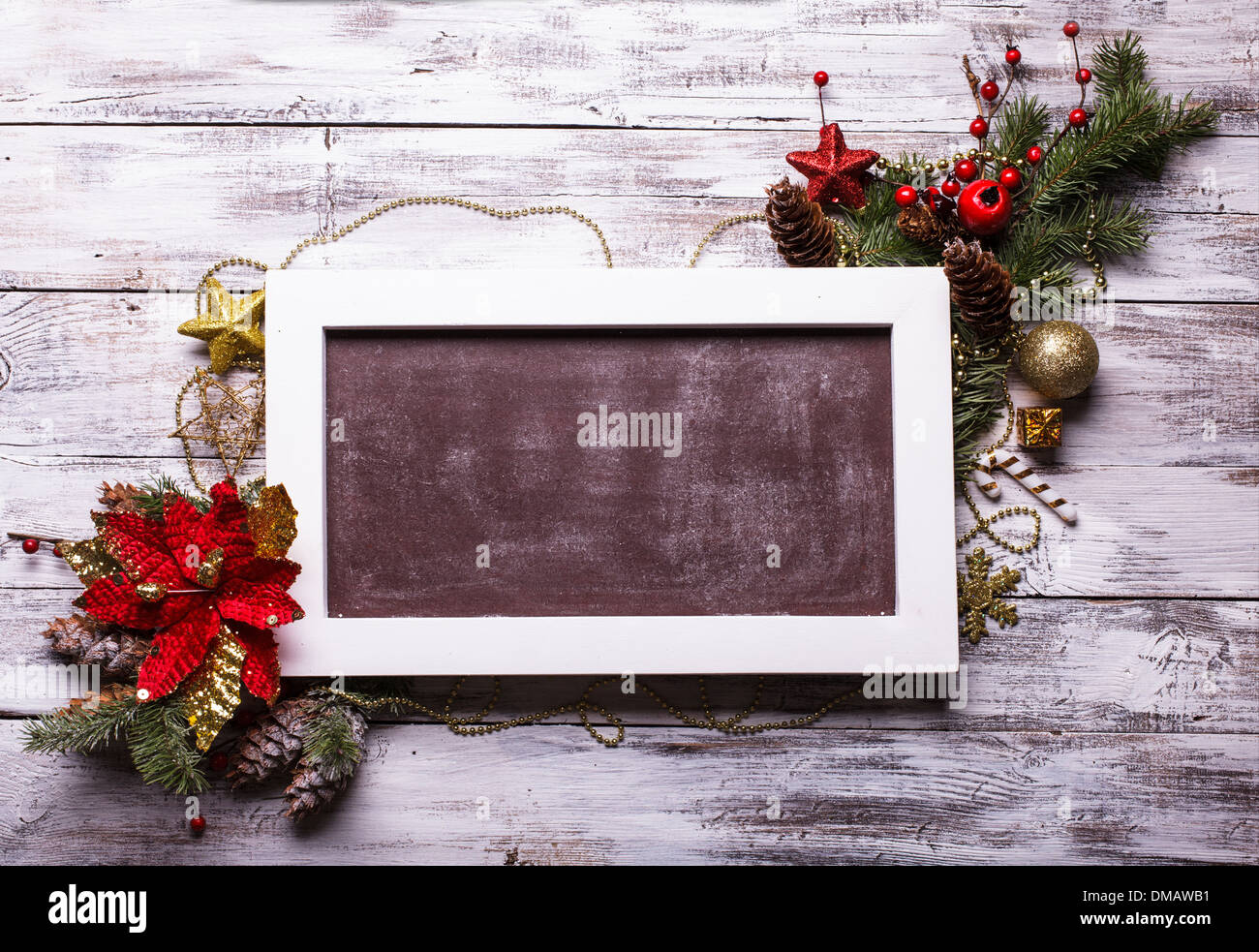 Christmas board design with poinsettia for greetings Stock Photo - Alamy
