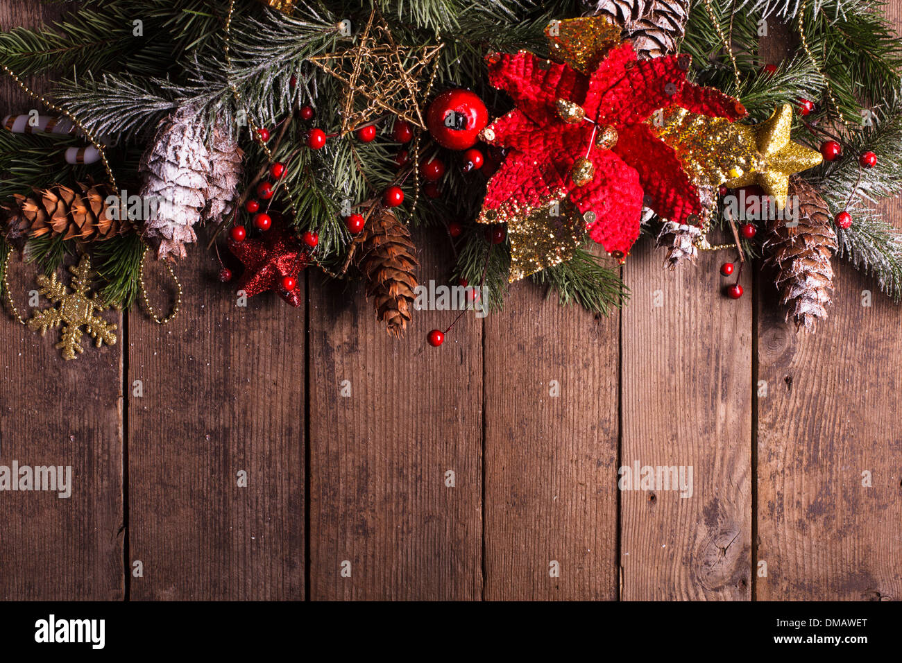 Christmas border design on the wooden background Stock Photo - Alamy