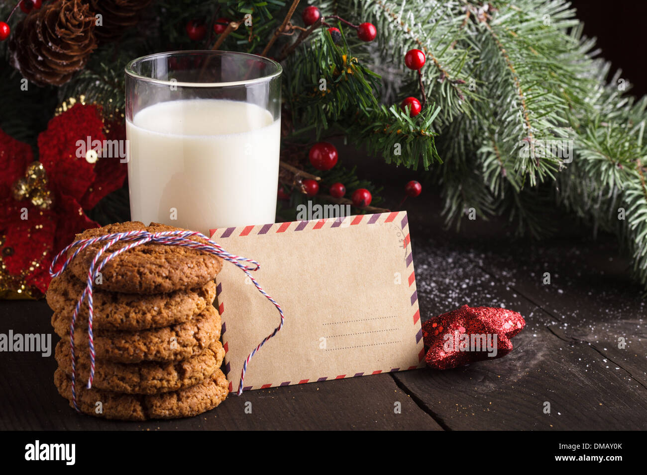 Cookie with milk and letter for Santa Claus Stock Photo - Alamy