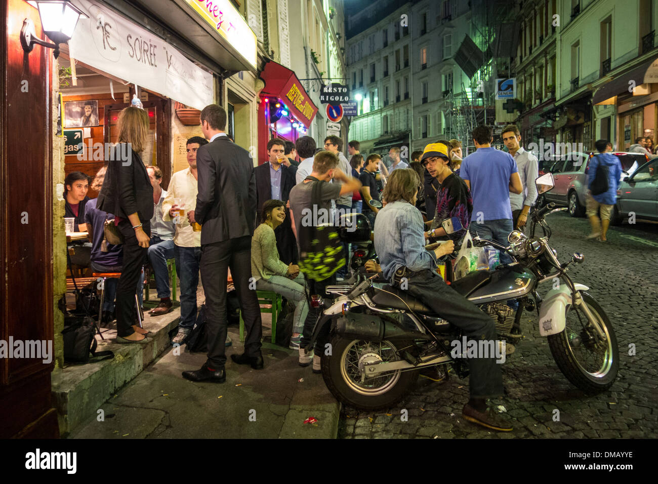 STREET AMBIANCE WITH CUSTOMERS, PARISIAN CAFE RESTAURANT, AT NIGHT, RUE ...