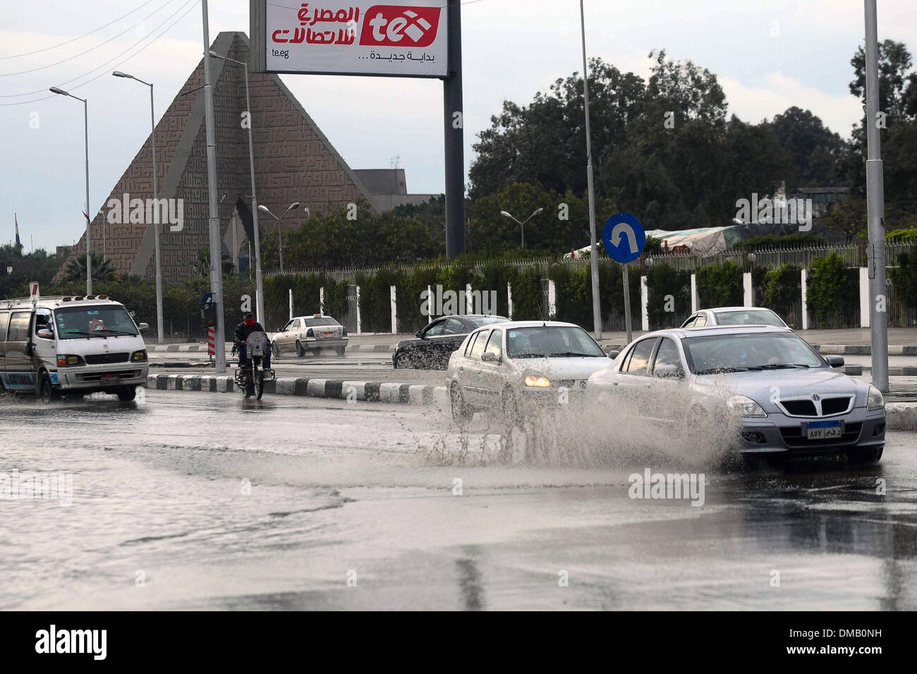 Cairo, Cairo, Egypt. 13th Dec, 2013. Vehicles travel in the rain in ...