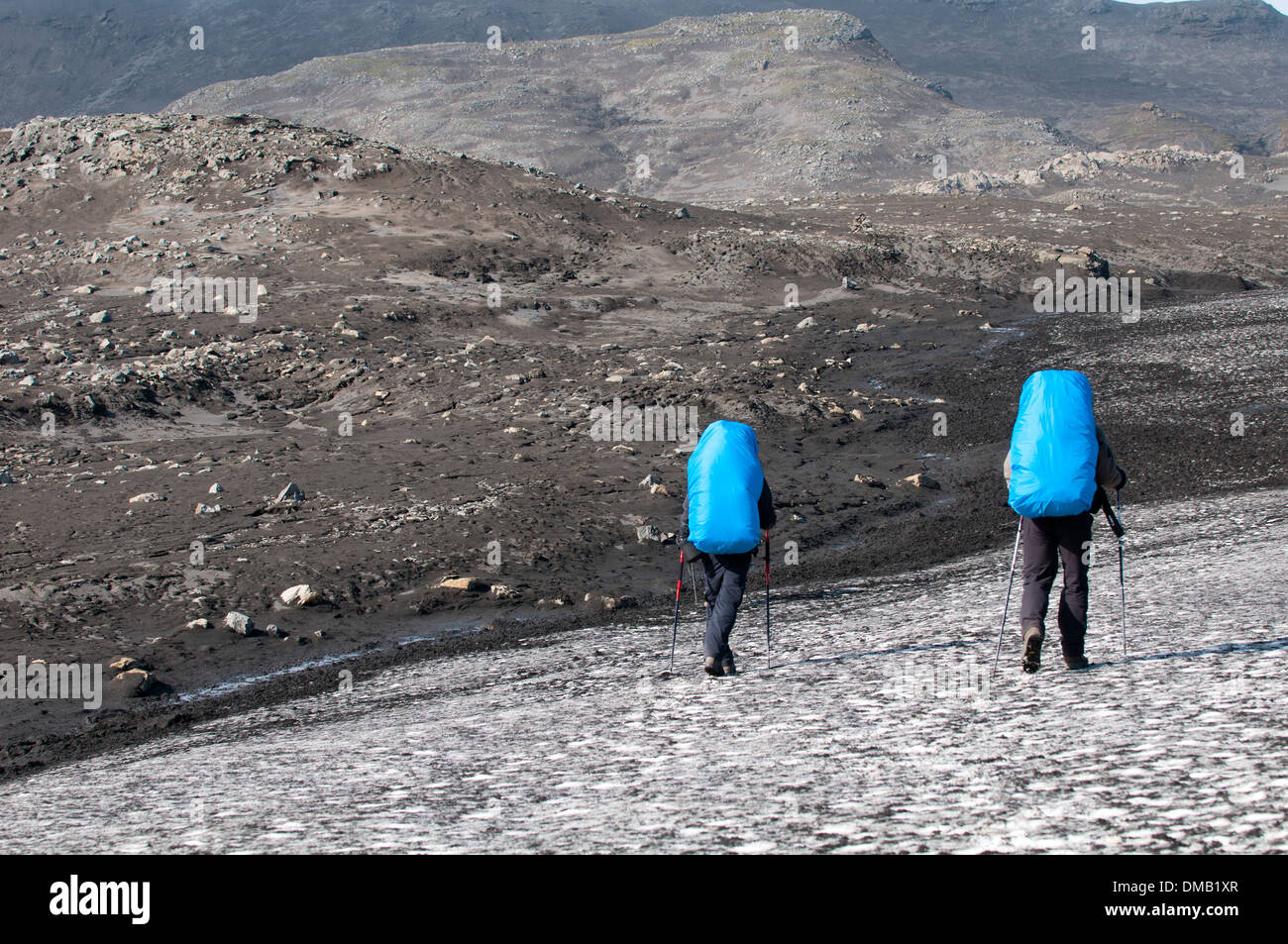 Hikers cross a snowfield, Landmannalaugar, Iceland Stock Photo - Alamy