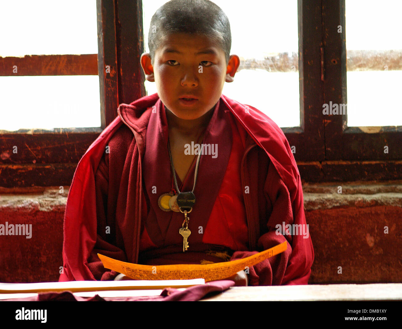 A young student monk recites ancient texts,Dgchenphodrang Monastery ...