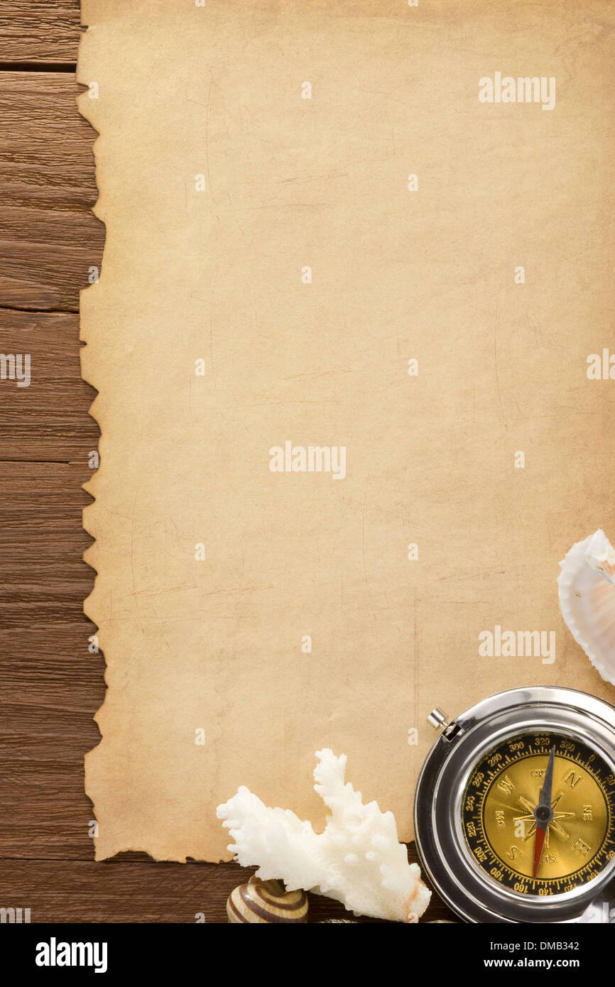 paper vintage background and compass on wood Stock Photo - Alamy
