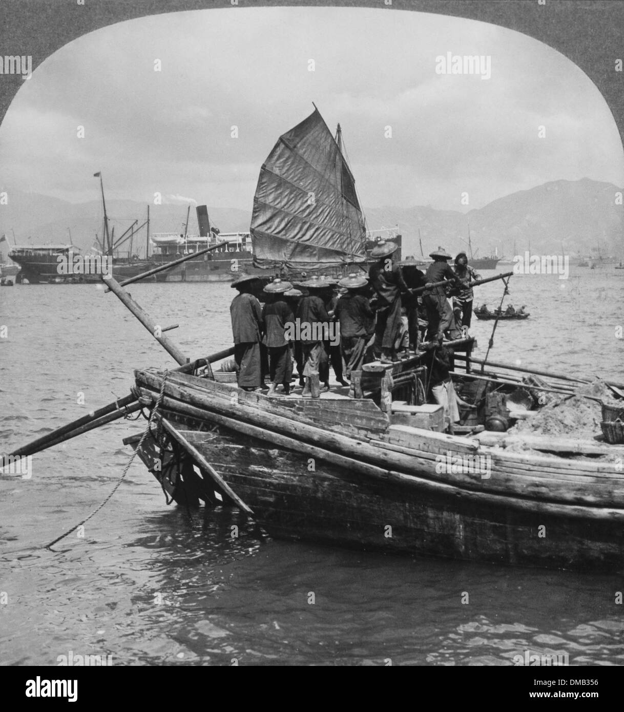 Group of Men on Fishing Boat in Harbor, Hong Kong, 1910 Stock Photo - Alamy