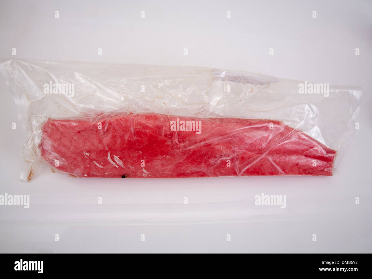 Frozen fish products laid on ice to be showcased for consumption ...