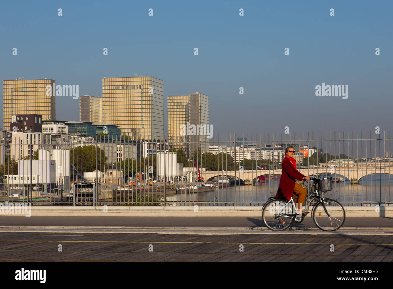 BIKE, CYCLIST, PONT NATIONAL BRIDGE AND THE NATIONAL LIBRARY OF FRANCE ...