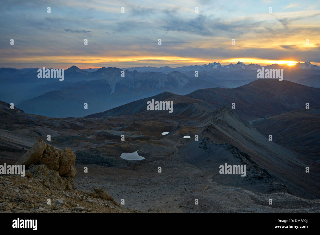 A stunning sunset high in the italian Alps on an extreme rocky ...
