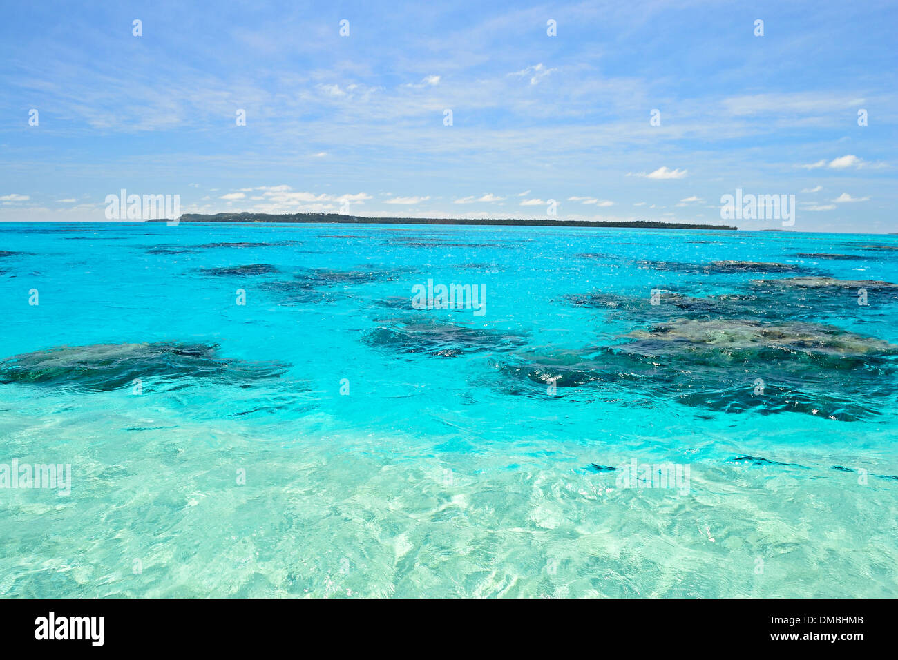 The colorful Aitutaki lagoon spotted by coral reef, in the middle of ...