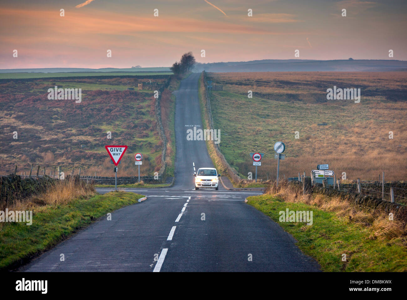 Crossroad, road with slow sign perspective, distance, vanishing point ...